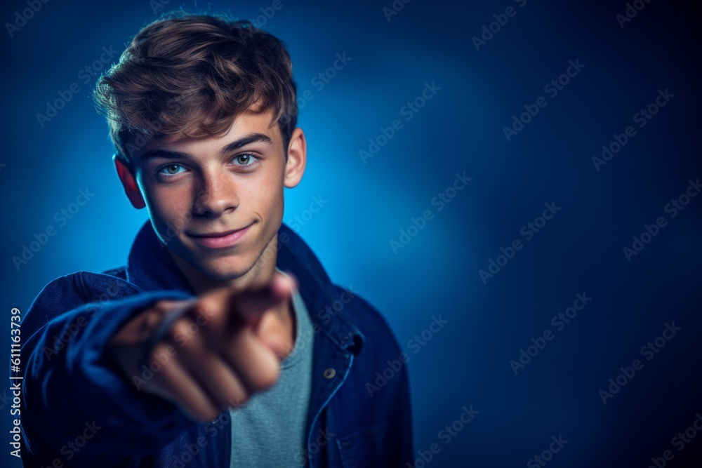 Headshot portrait photography of a satisfied boy in his 20s pointing ...