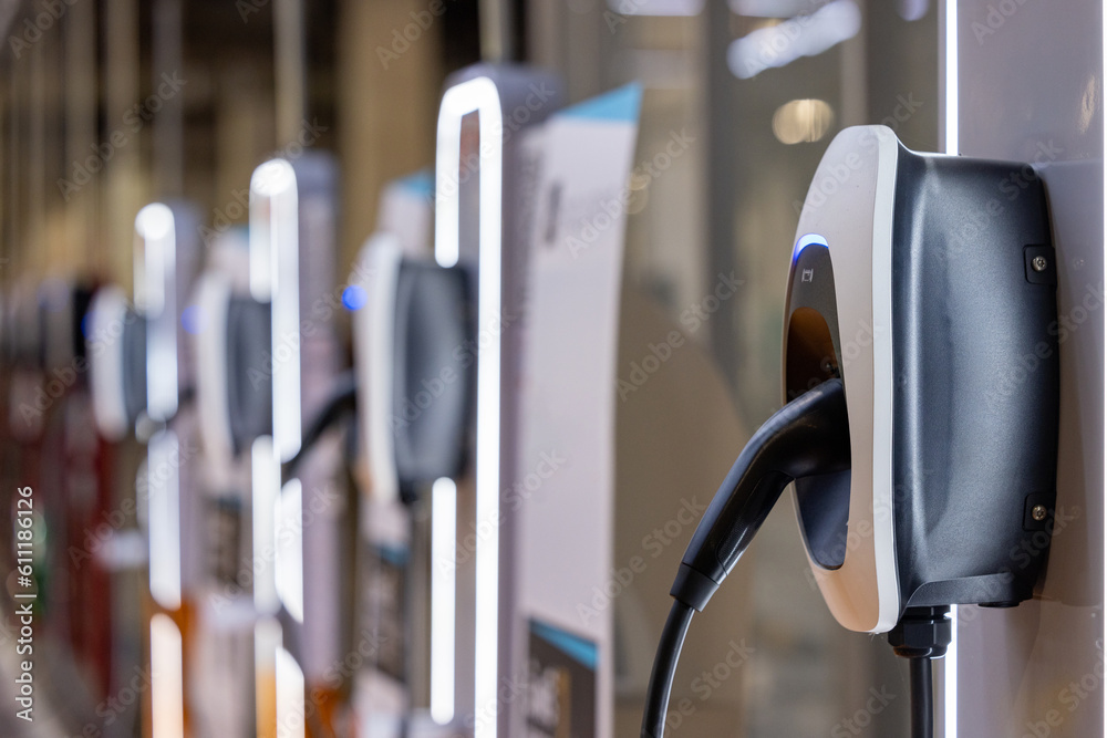 EV charging an electric car. Power supply for electric car charging ...