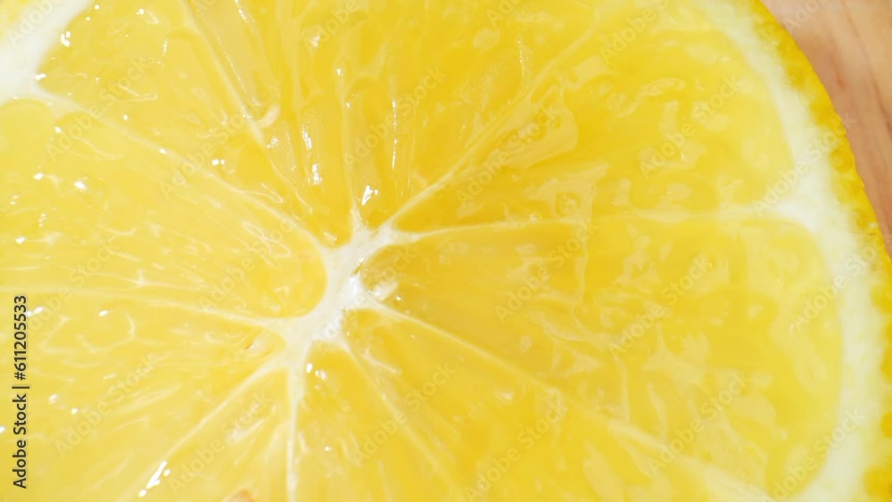 Captured in macro detail, the interior of a lemon showcases a maze of ...