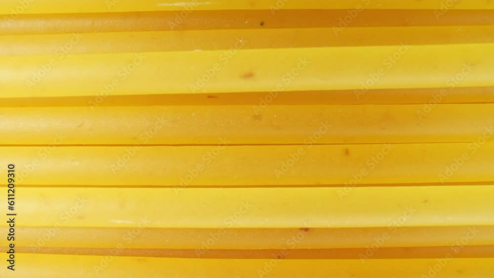 Captivating close-ups of uncooked spaghetti reveal its delicate texture ...