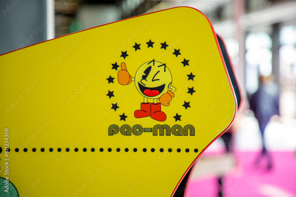 Pac-Man logo sign icon on maze arcade game yellow video console vintage ...