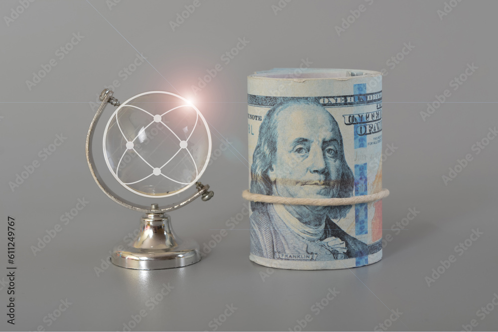 Money banknotes and world globe. The striking image of a globe ...