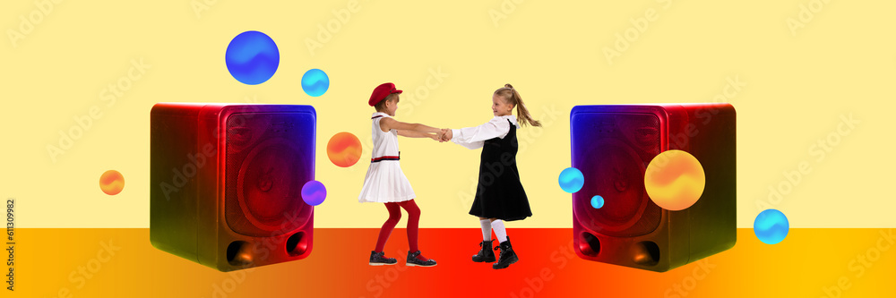 Happy little girls. children dancing, having fun, playing and listening ...