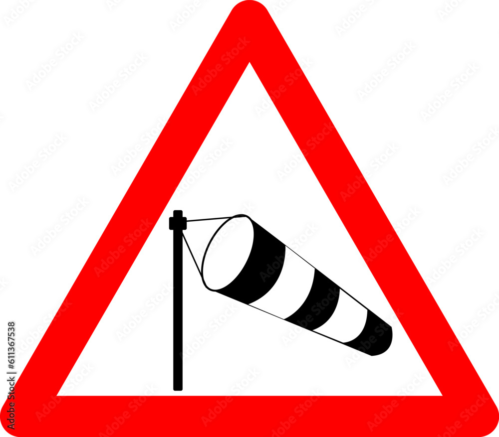 Side wind sign. Side wind warning sign. Red triangle sign with a cone ...