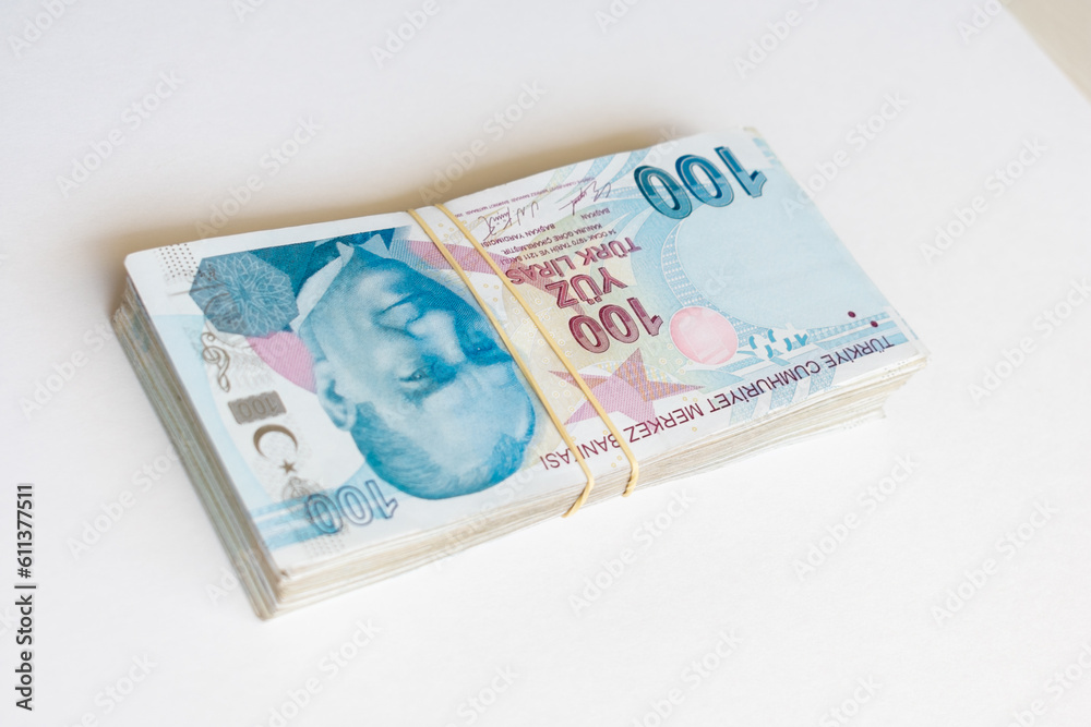 A stack of one hundred Turkish lira bills. A stack of one hundred ...