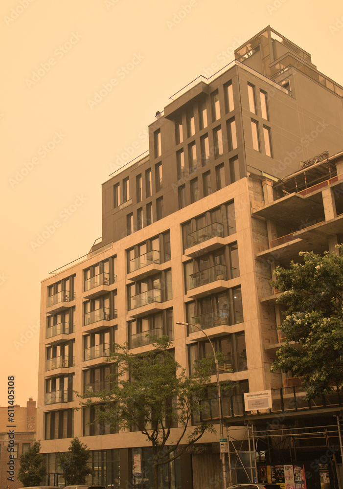 apartment building in haze from forest fires in canada (smog, smoke ...