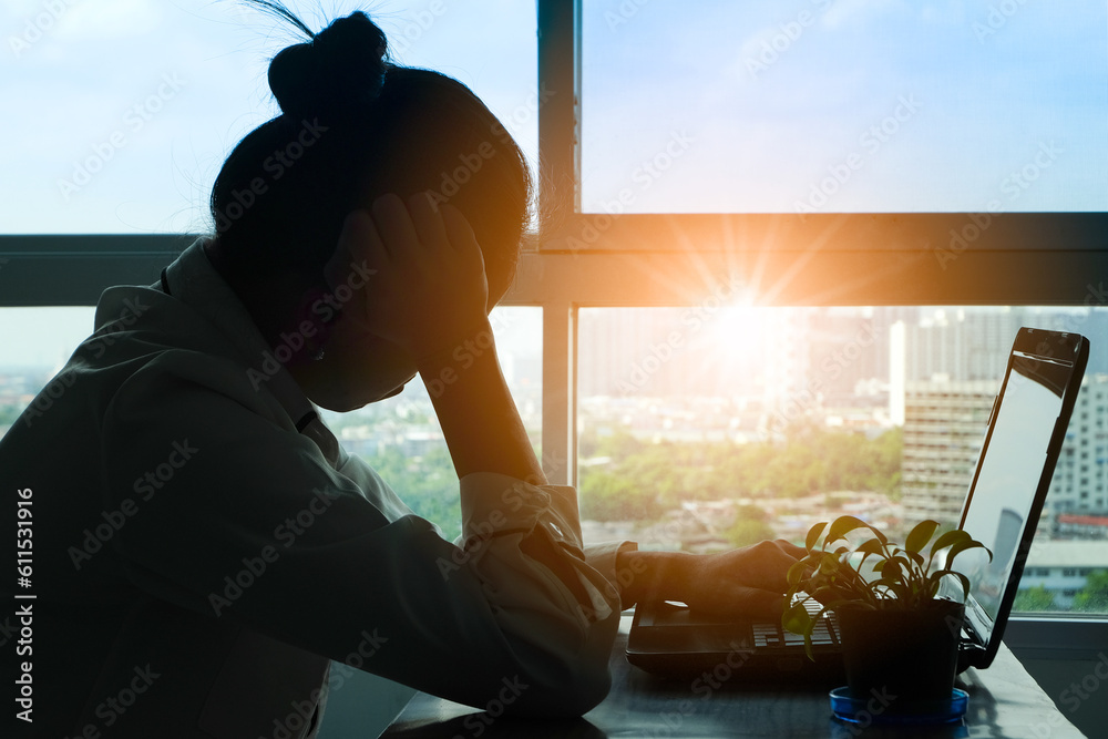 woman sitting down, his face unsettled. At the computer desk she has ...