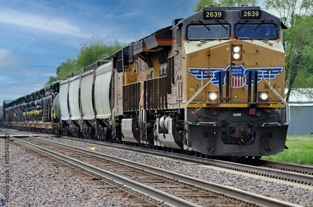 Union Pacific locomotives on the point of a freight train as it passes ...