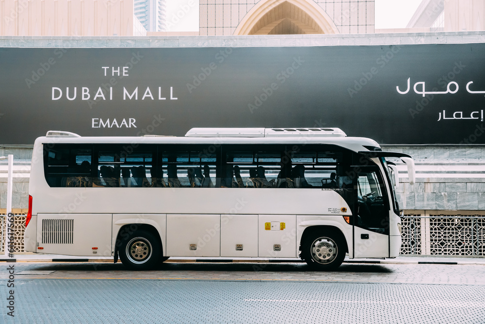 Dubai, UAE, United Arab Emirates - May 28, 2021: White bus parking near ...