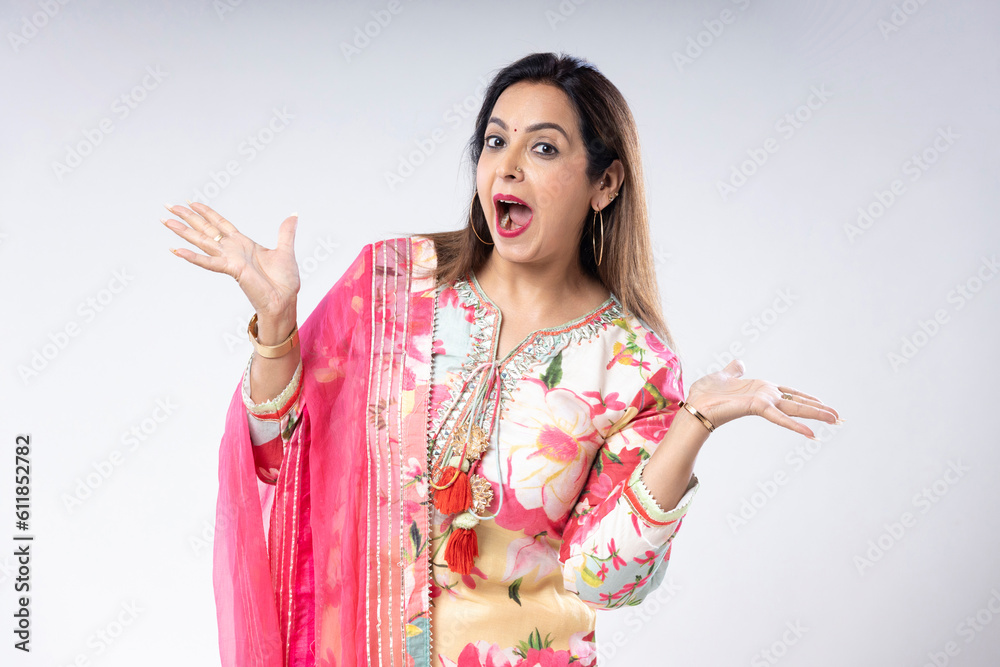 Indian woman giving shocking expression on white background. Stock ...