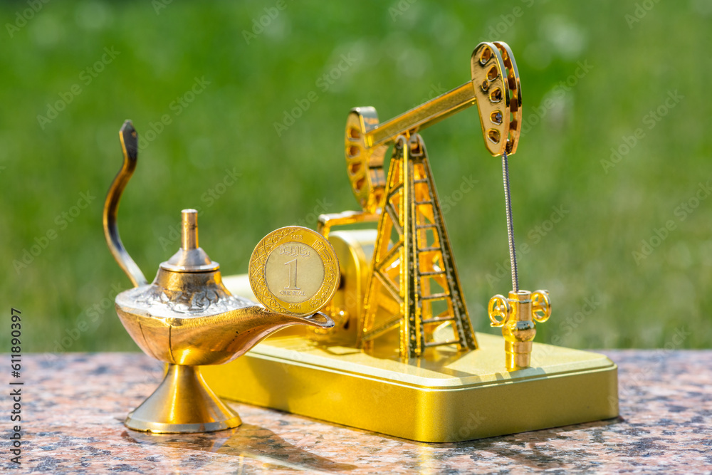 Aladdin's magic lamp, 1 riyal coin of the Kingdom of Saudi Arabia and a ...