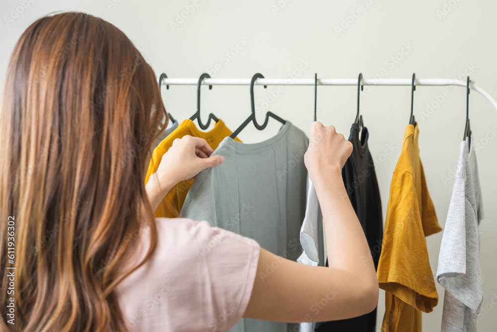 Choice of clothes,Nothing to wear. Attractive asian young woman, girl ...