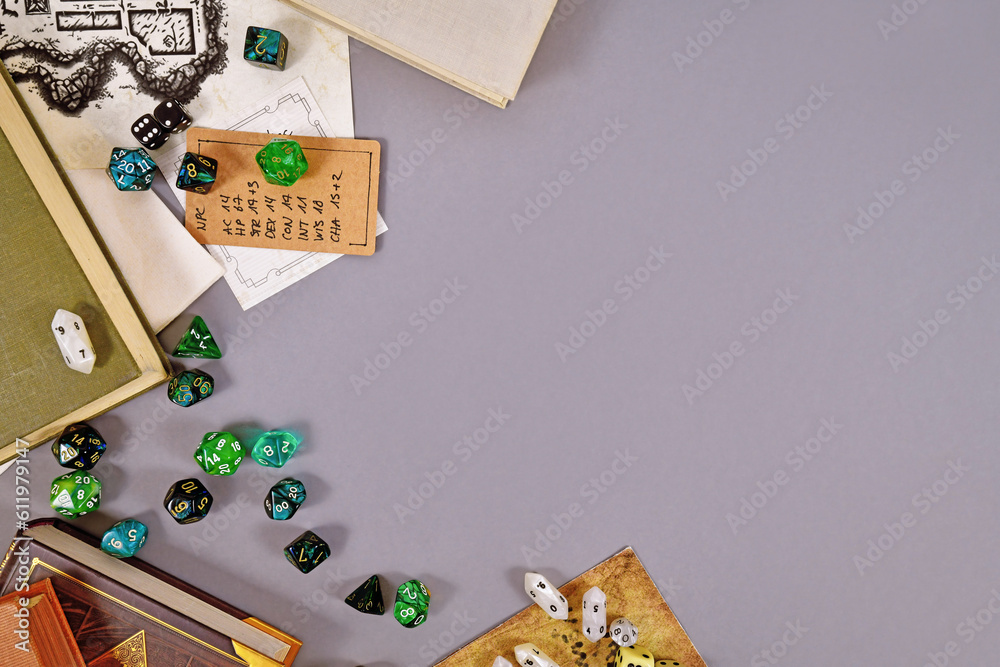 Tabletop roleplaying flat lay with RPG and game dices, rule book, notes ...