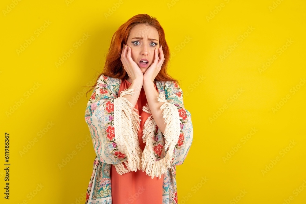 Stupefied young beautiful red haired woman expresses excitement and ...