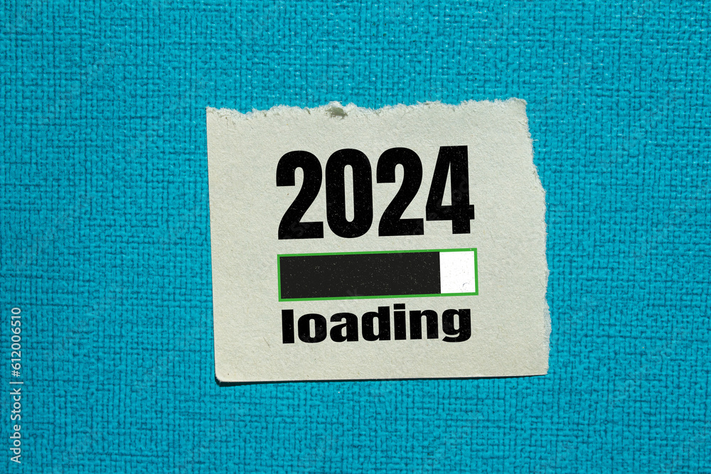 New year 2024 concept. Loading 2024 symbol on paper. Stock Photo ...