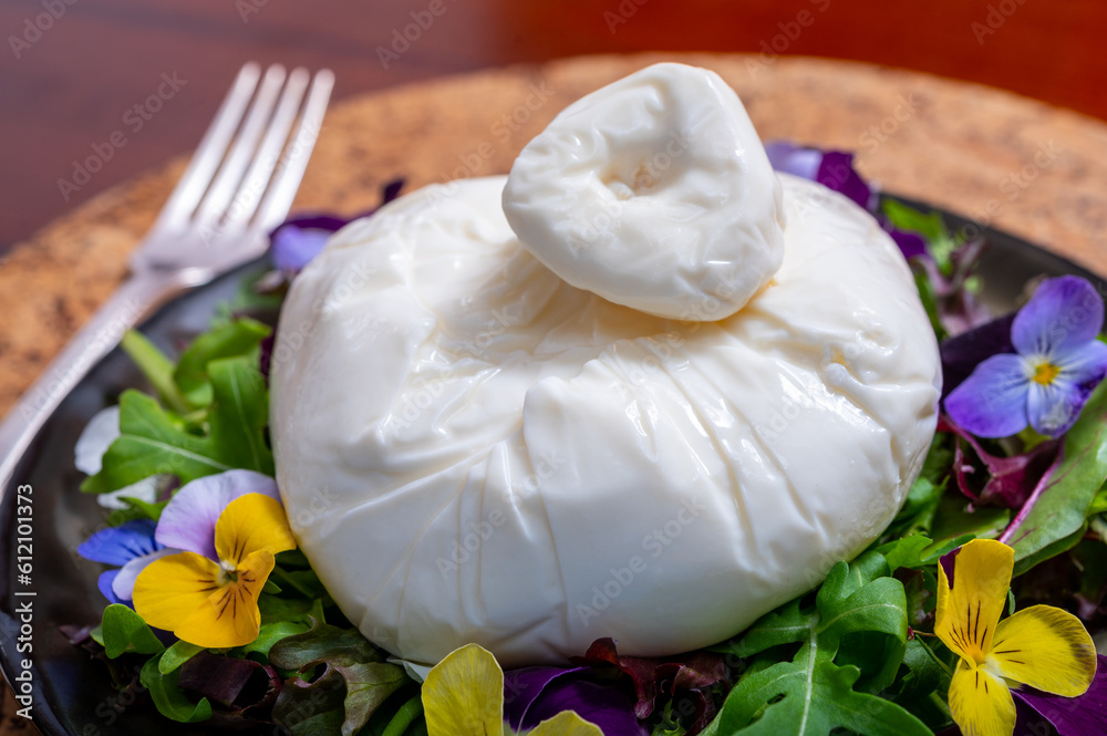 Fresh handmade soft Italian cheese from Puglia, white ball of burrata ...