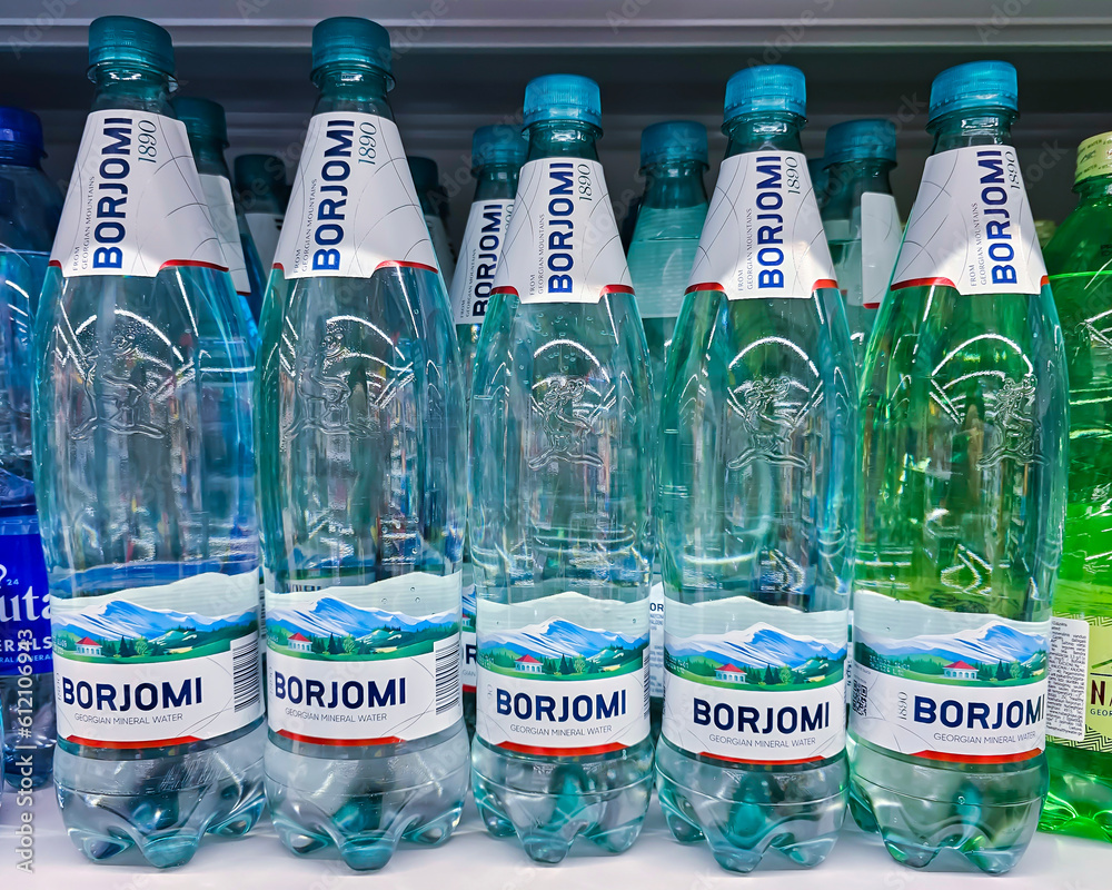 LATVIA, RIGA, MAY, 2023: Borjomi is mineral water on a supermarket shelf. Georgian Glass ...