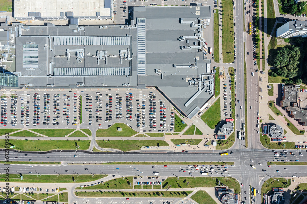 urban road intersection with cars traffic in residential area. large ...