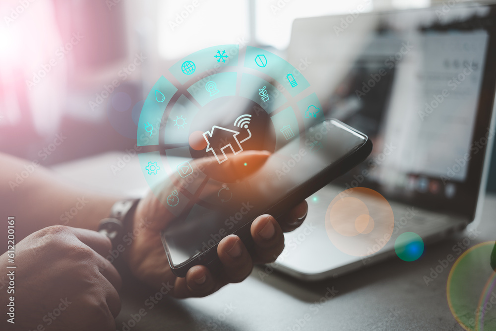 Smart home automation concept on virtual screen in man hand. Smart home and future concept ...