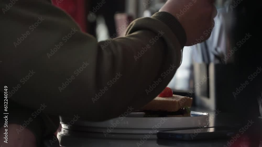 Close up shot hand of people prepare the sandwich for breakfast and ...