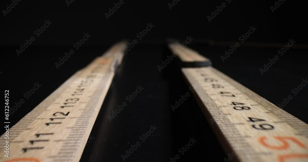 Background of several wooden rulers placed in centimeters and ...