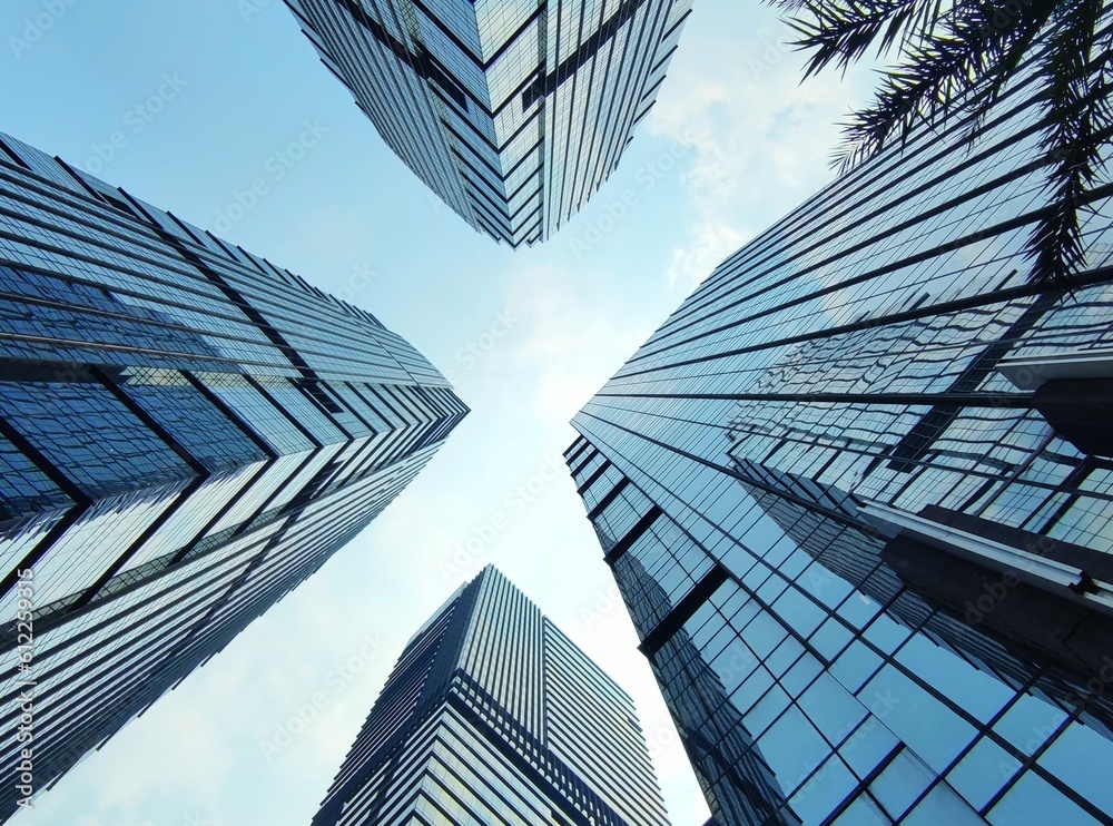 Low angle view and perspective of modern office building with ...