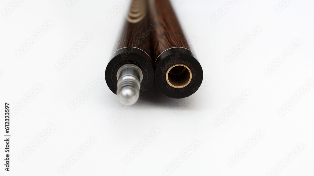 Billiard cues on a white background. Parts of a billiard cue close-up ...