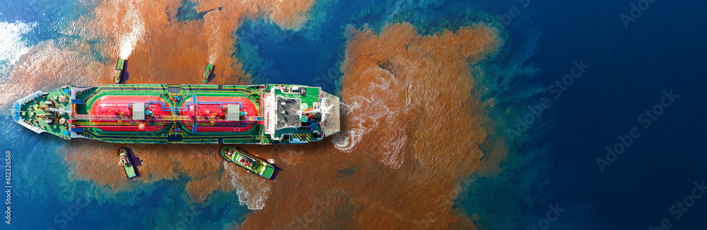 Oil leak from Ship , Oil spill pollution polluted water surface. water ...