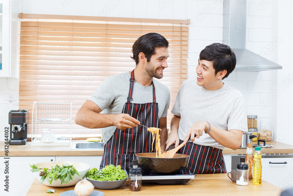 Lgbtq Gay Bisexual Cooking Their Meal Together In The Kitchen Lgbtq