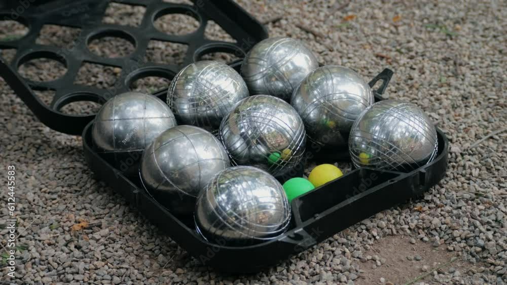 Petanque balls boules bowls on sand gravel court background in ...