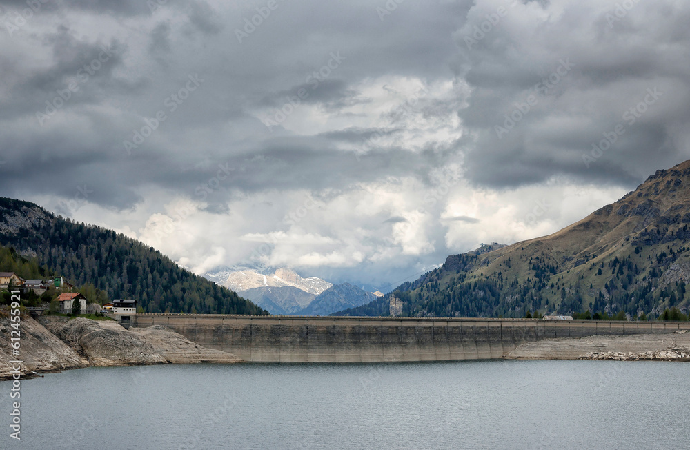 Fedaia dam lake under Marmolada mountain, Dolomites, Italy, Europe ...
