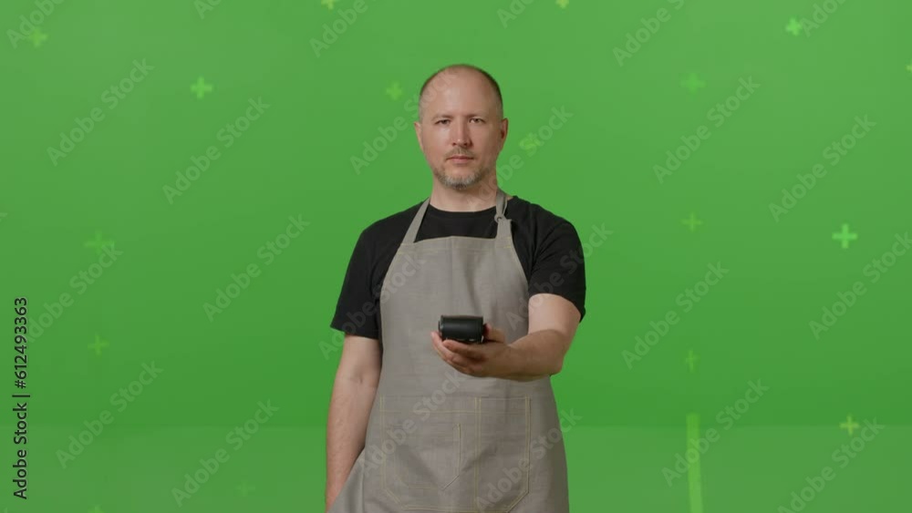 Side view of Caucasian male waiter hold wireless bank payment POS ...