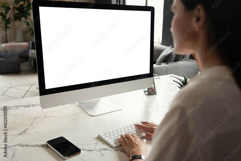 Attractive young woman working at office, using contemporary desktop ...