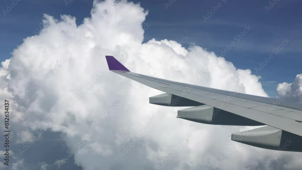 airplane window View of Beautiful Cloud sky with plane wings for travel ...