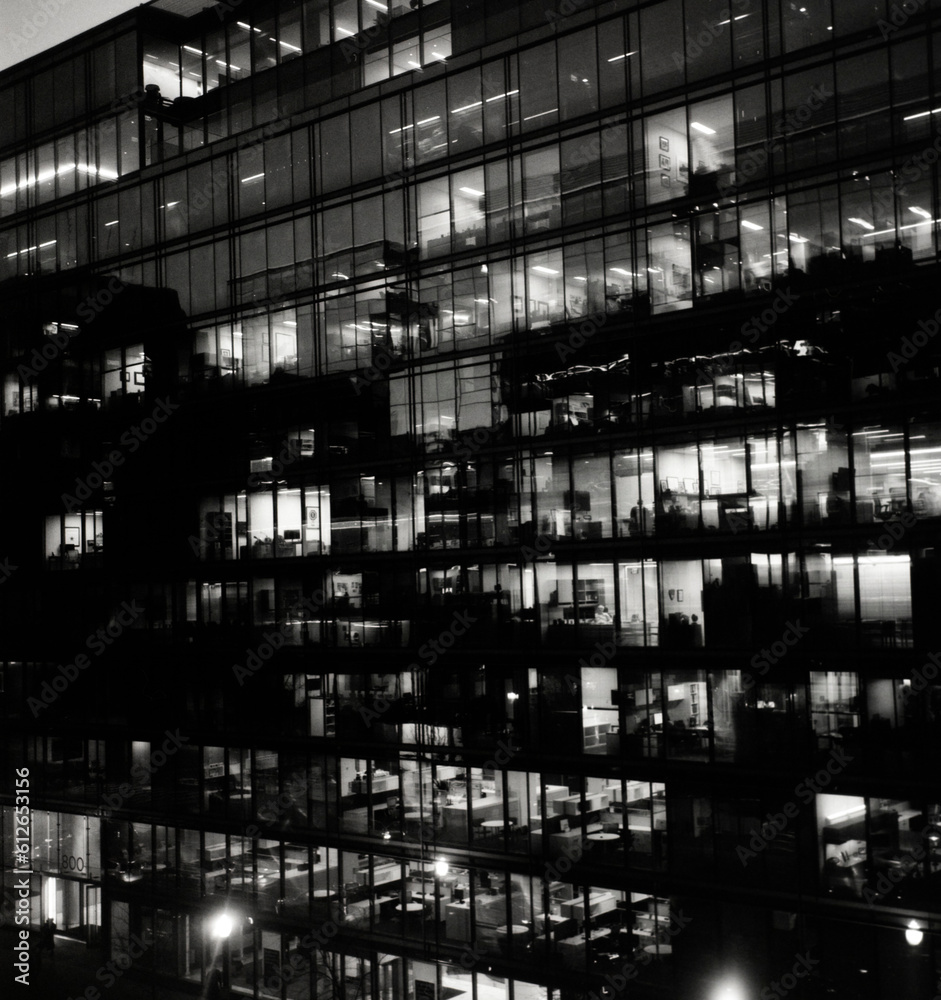 An office building at night. Stock Photo | Adobe Stock