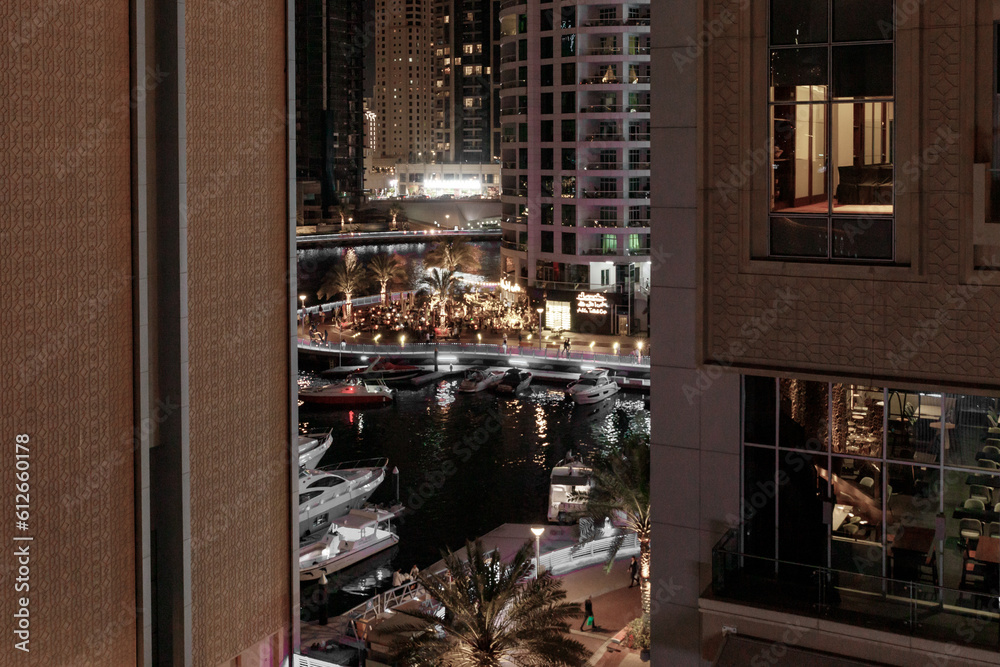 Night view from the promenade of Dubai Marina with illuminated ...