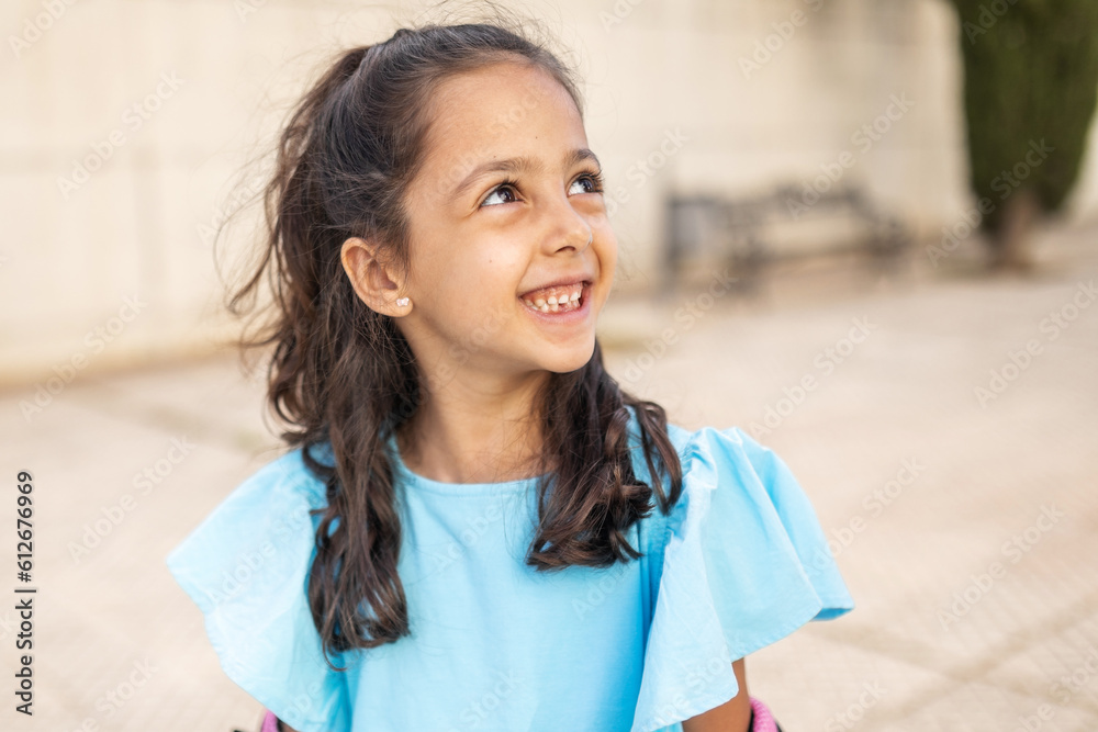 portrait of little girl outdoors Stock Photo | Adobe Stock