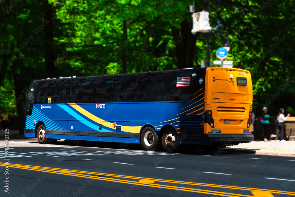 MTA NYC bus logo on a blue and white color omnibus in NYC. Taken on May ...