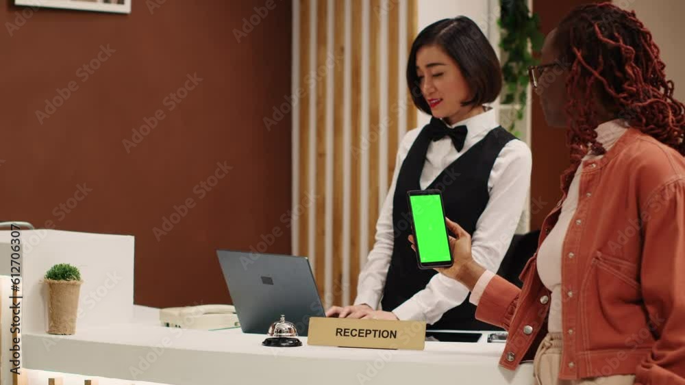 Tourist holding chroma key green screen mock up smartphone waiting at ...