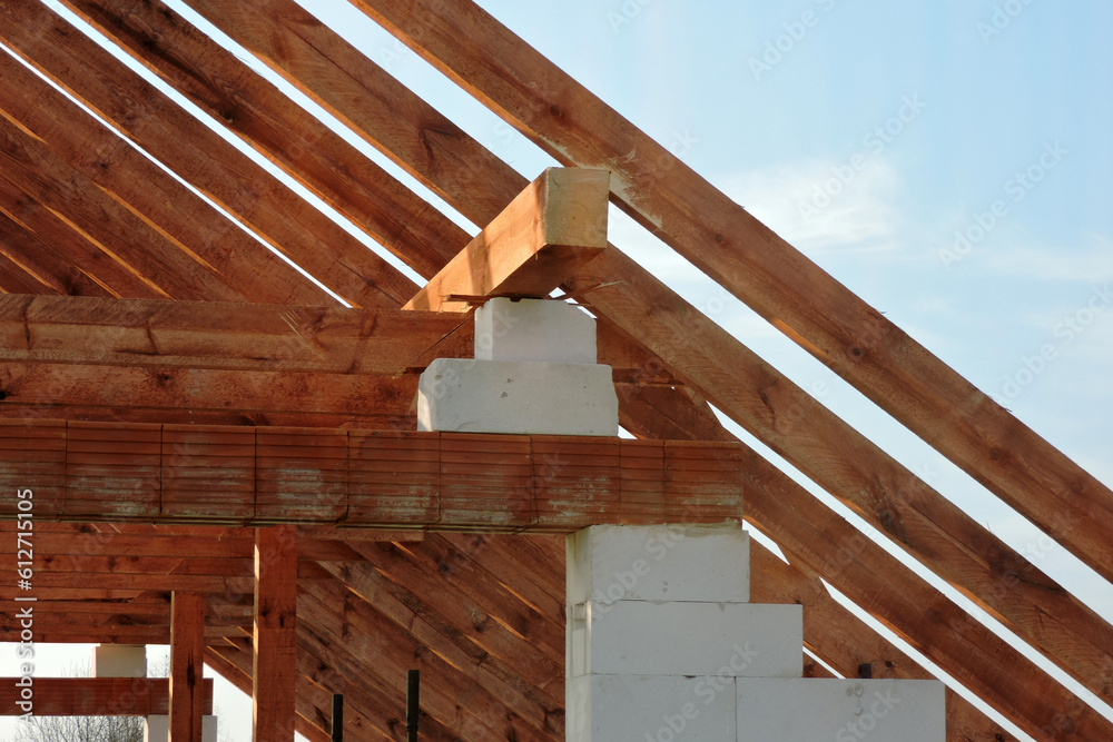 Wooden rafters and a wall plate, walls made of autoclaved aerated ...