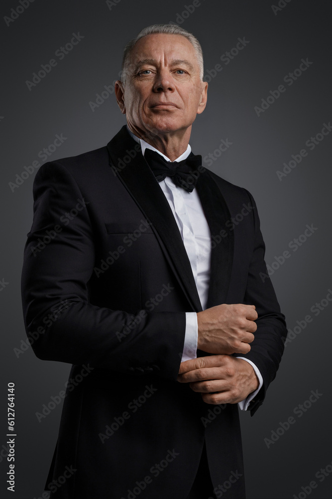 Distinguished older gentleman exudes confidence in this photo, dressed ...