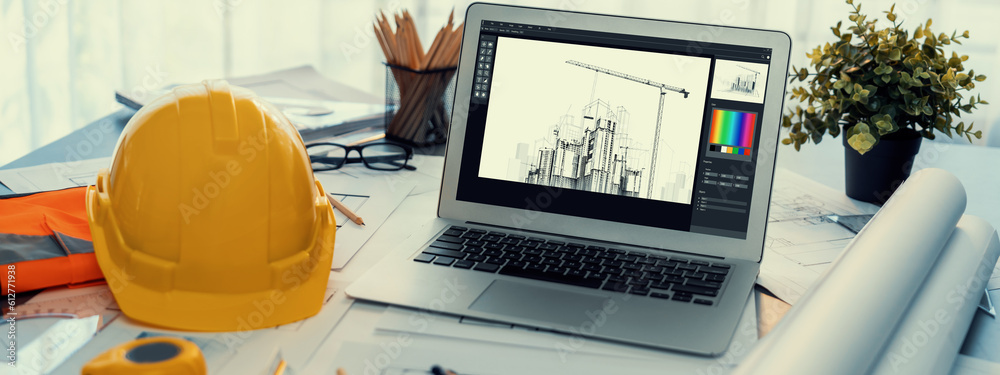 Digital blueprint by architecture design software on laptop screen with ...