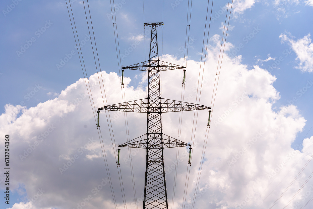 High voltage towers with sky background. Power line support with wires ...