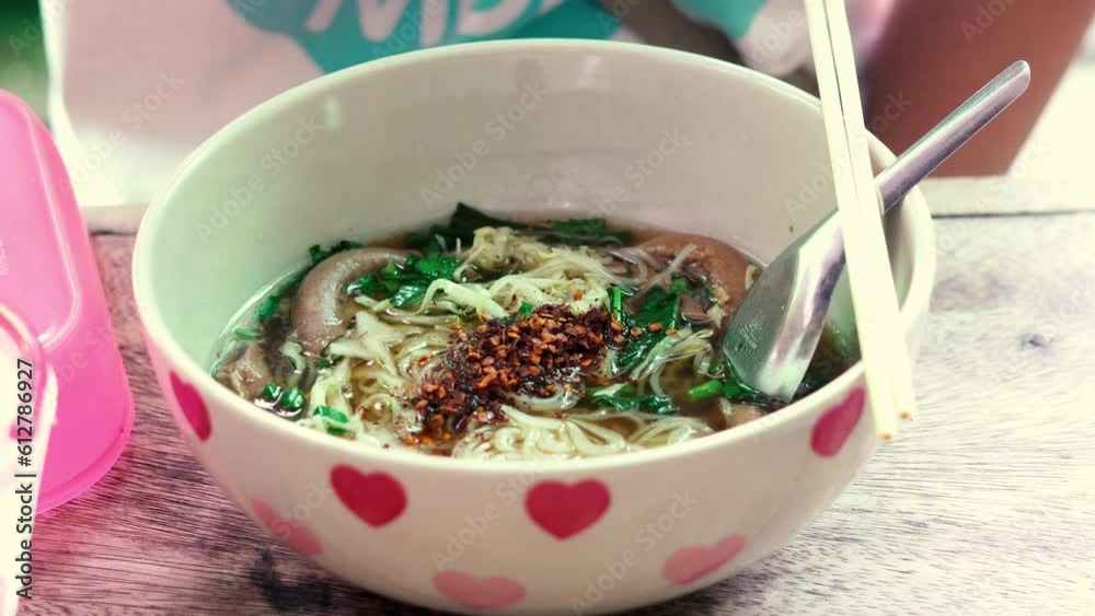 Rice Noodles Beef Soup with Beef Intestine Braised ontop Garlic and ...