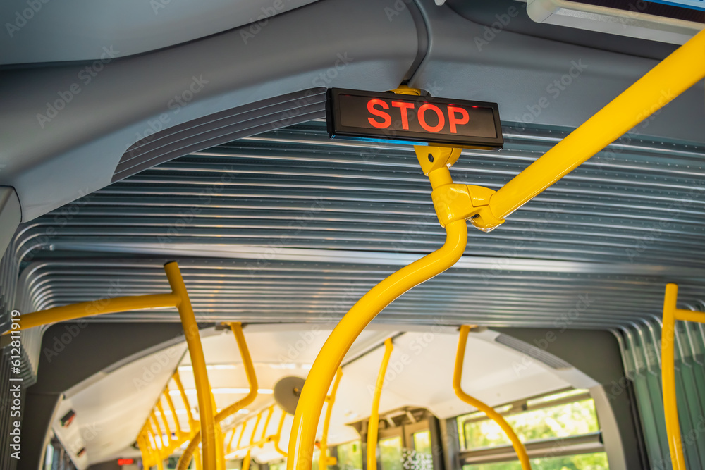 Stop sign in city bus. Empty bus interior. Bus with blue seats and ...