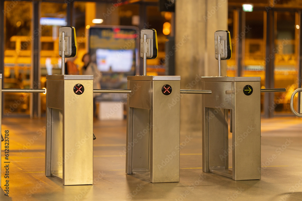 Access turnstiles from the subway in the late evening - LED-lighting ...