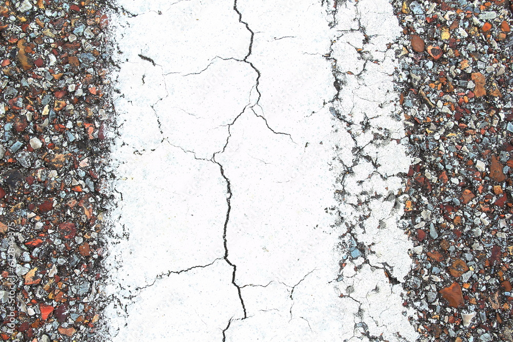 white paint color divider safety line on road,asphalt crack rough ...