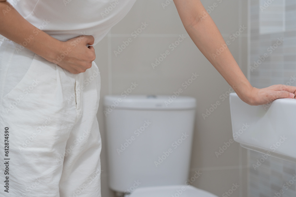 Constipation and diarrhea in bathroom. Hurt man touch belly stomach ...