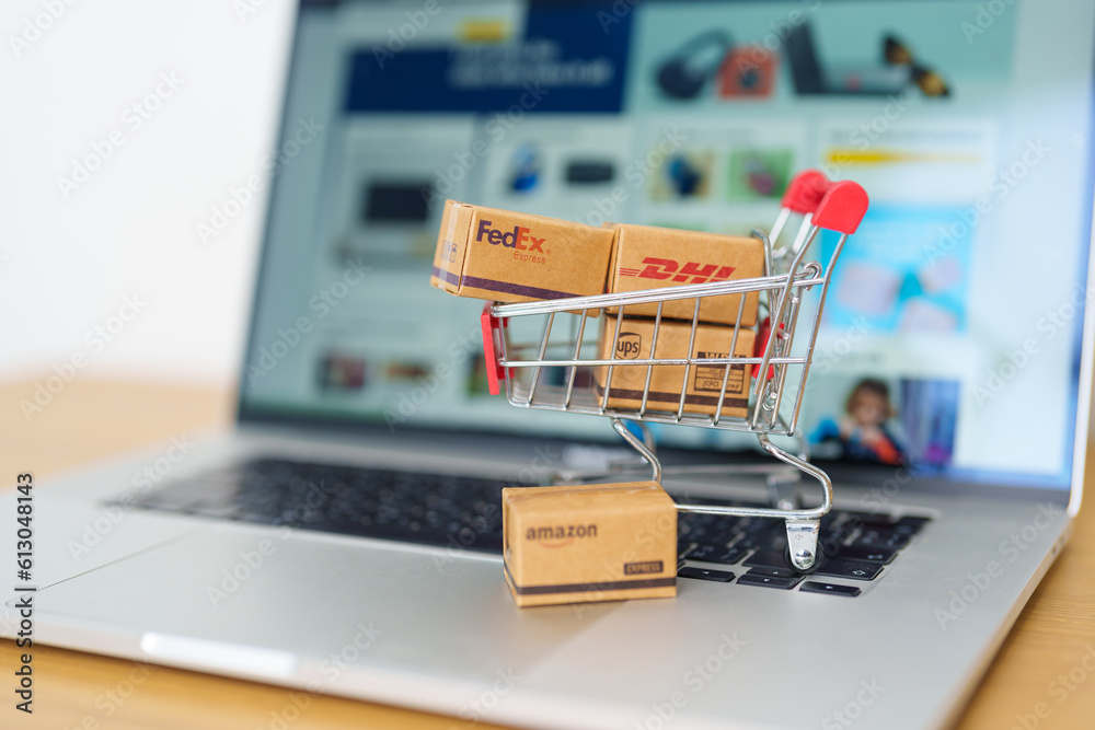 Shipping Boxes on laptop. Popular worldwide shipping and logistic ...