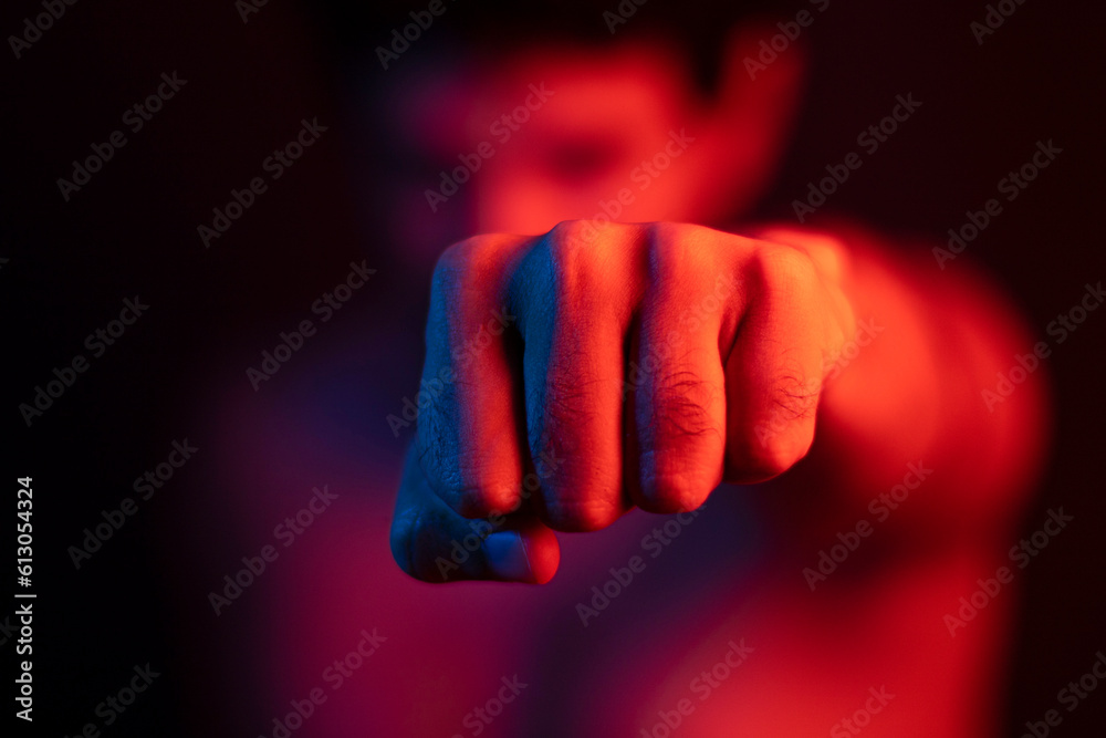 Shirtless violent young man throwing punch. Aggression, punch, fight ...